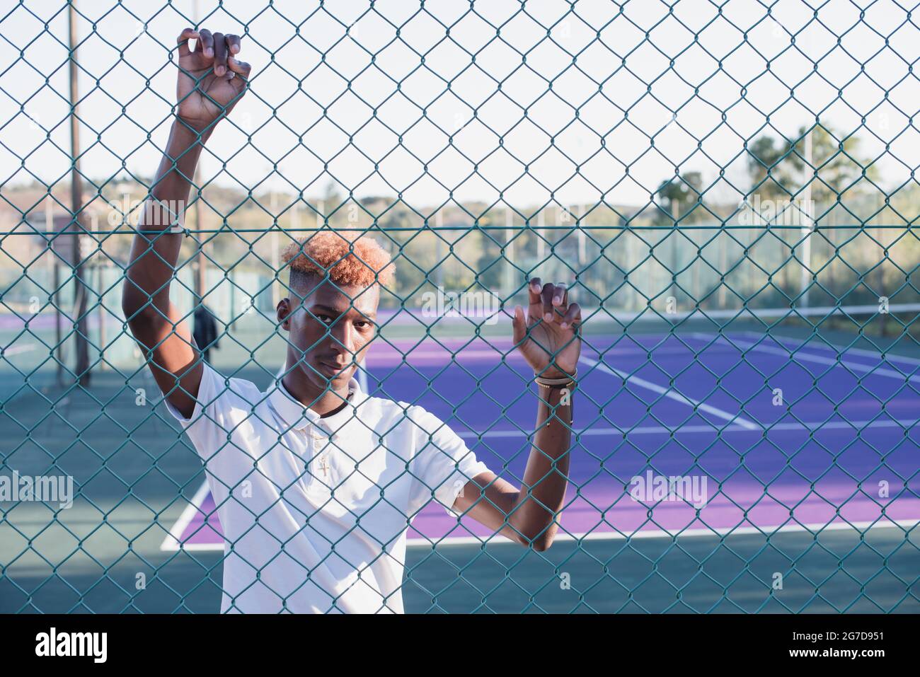 Man, chain link fence hi-res stock photography and images - Alamy
