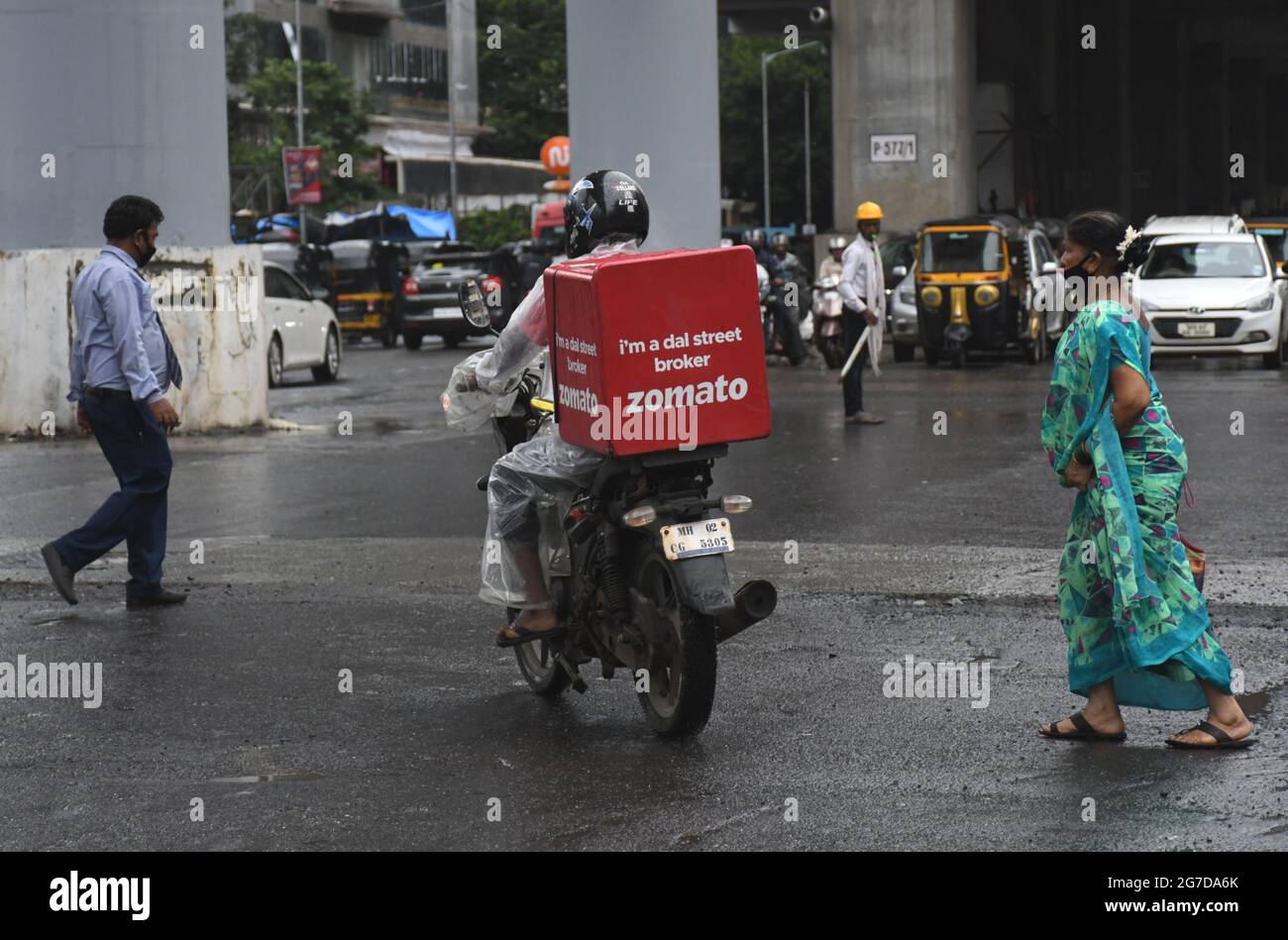 A Zomato delivery man seen riding along the streets of Mumbai.Zomato ...