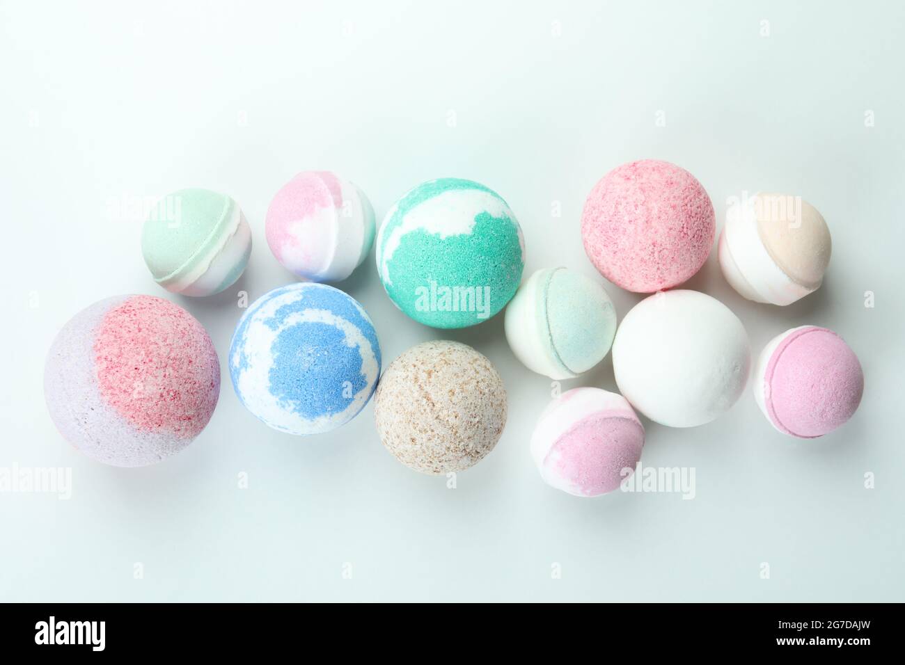Different bath balls on white background, top view Stock Photo - Alamy