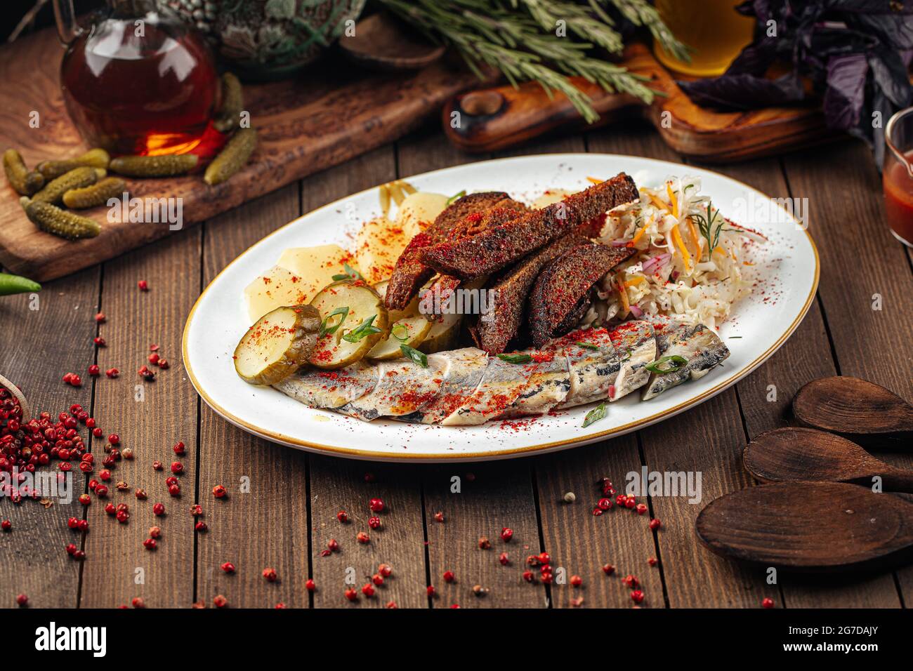 Traditional russian snacks with herring and pickle Stock Photo - Alamy