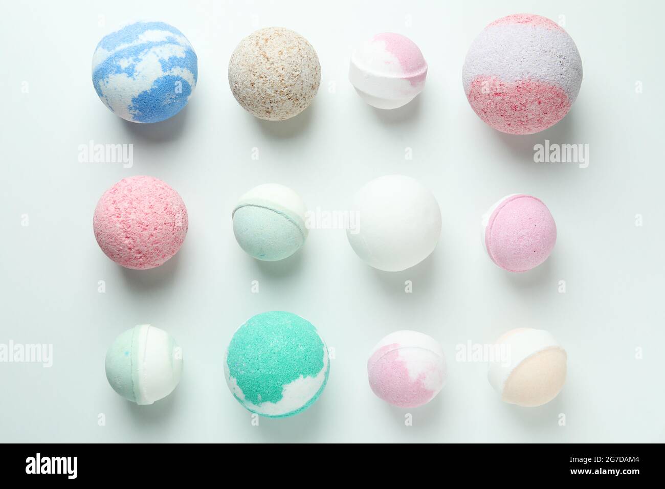 Bath balls on white background, top view Stock Photo - Alamy