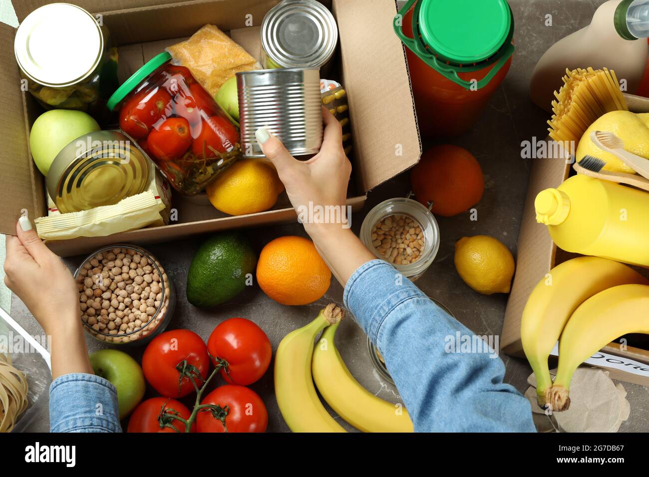 Charity giving food hands hi-res stock photography and images - Alamy