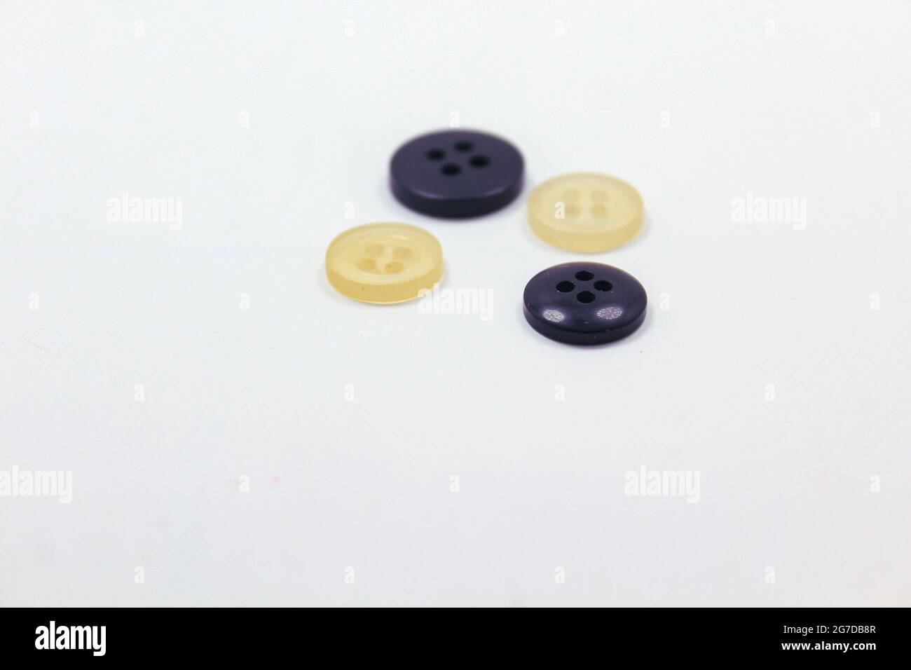 Botton on isolated white background Stock Photo - Alamy