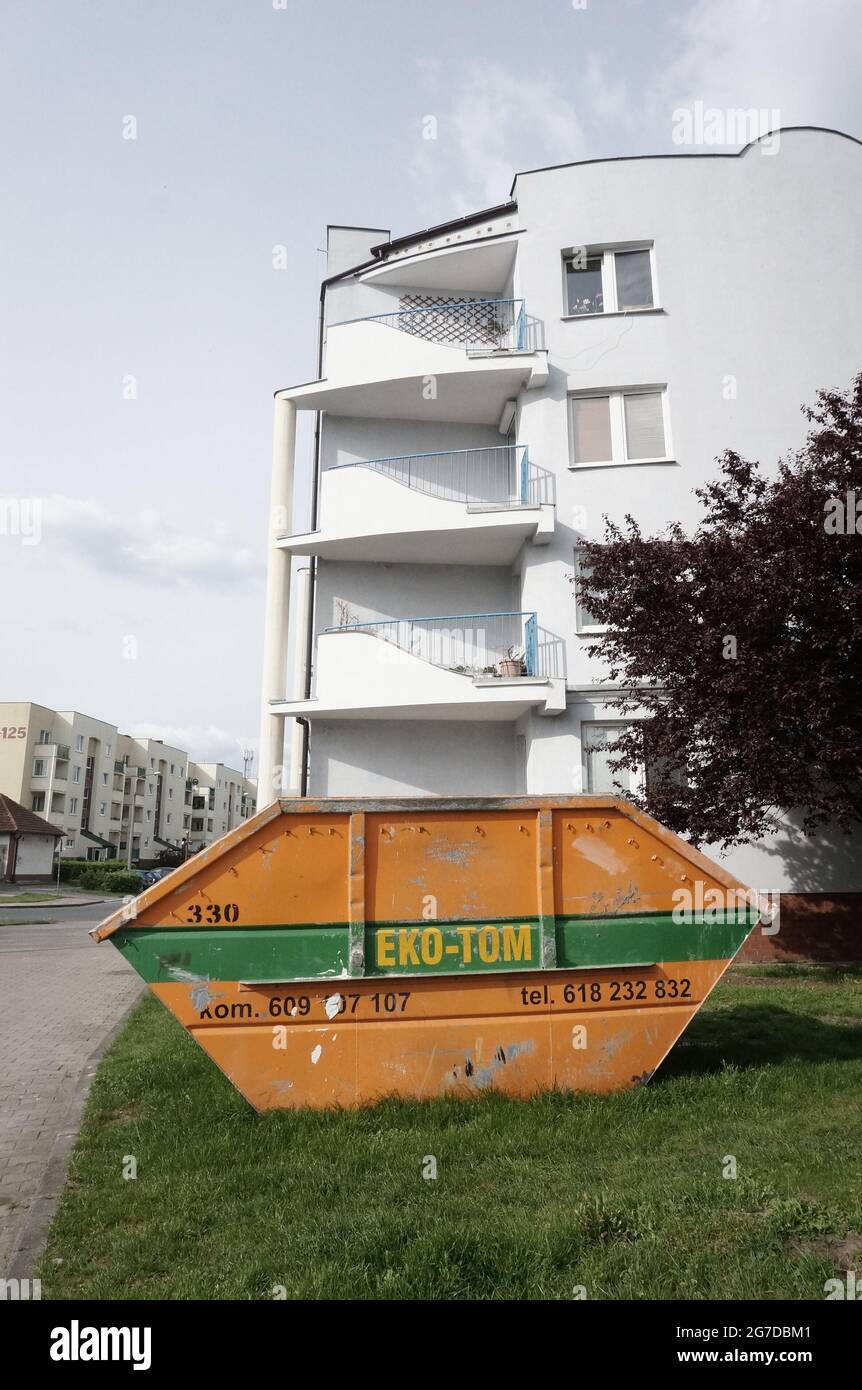 POZNAN, POLAND - May 16, 2017: A metal waste container in front of an ...
