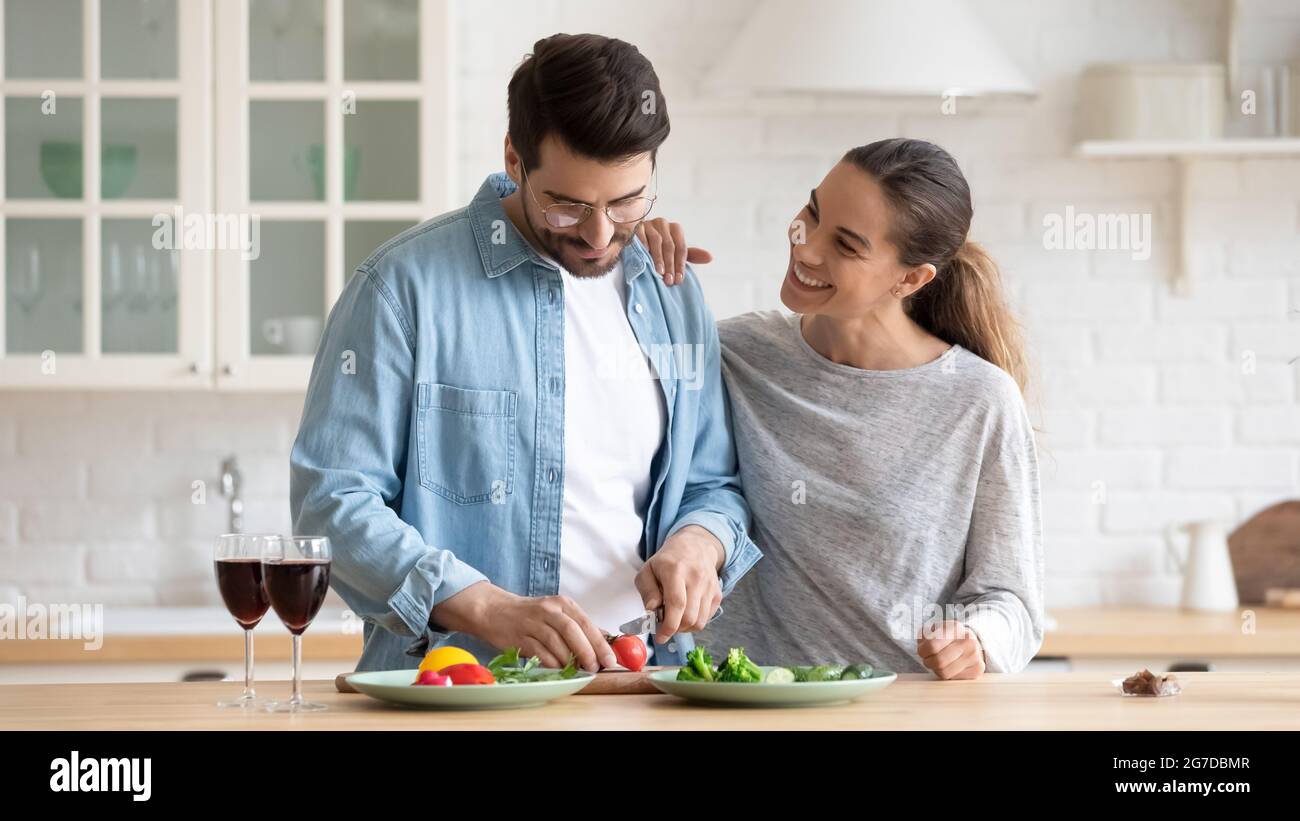 Woman cooking romantic dinner hi-res stock photography and images - Alamy