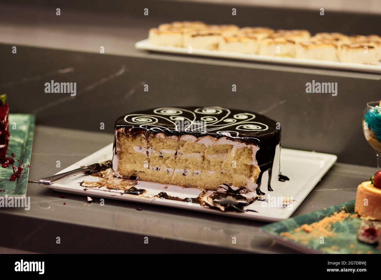 Chocolate cake dessert for picking up from buffet for hotel system of ...
