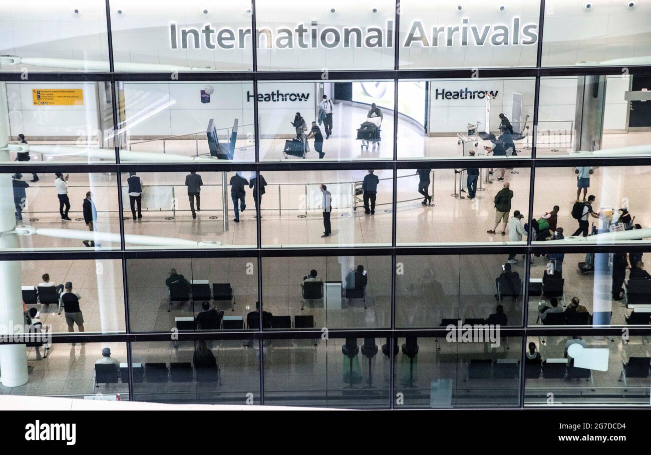 Terminal 2 arrivals heathrow hi-res stock photography and images - Alamy