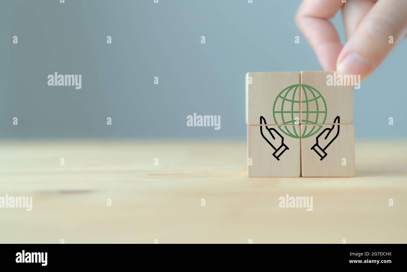 Social responsibility core value concept with hand and globe icon on ...