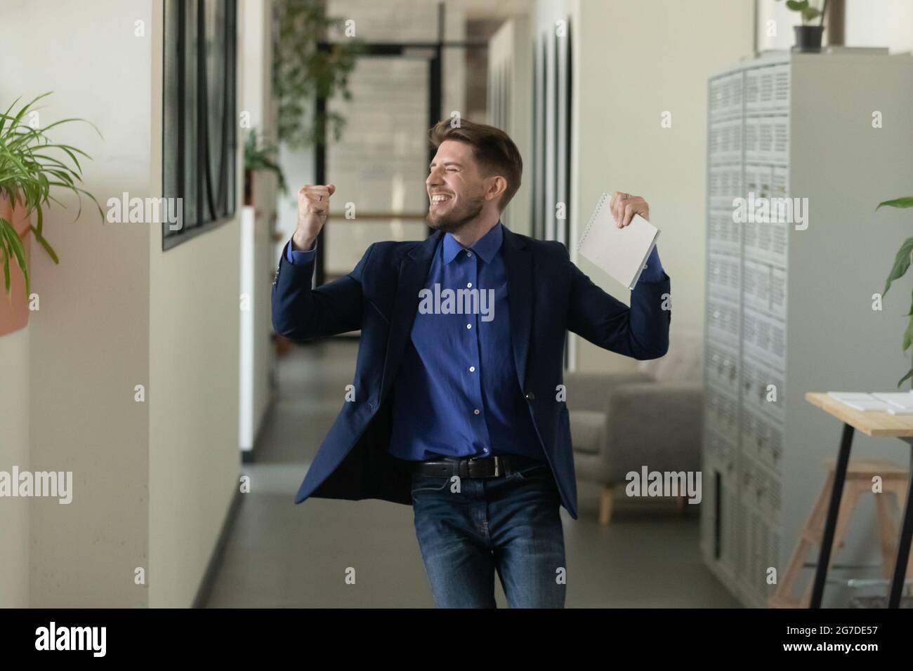 Happy office guy excited getting hi-res stock photography and images ...