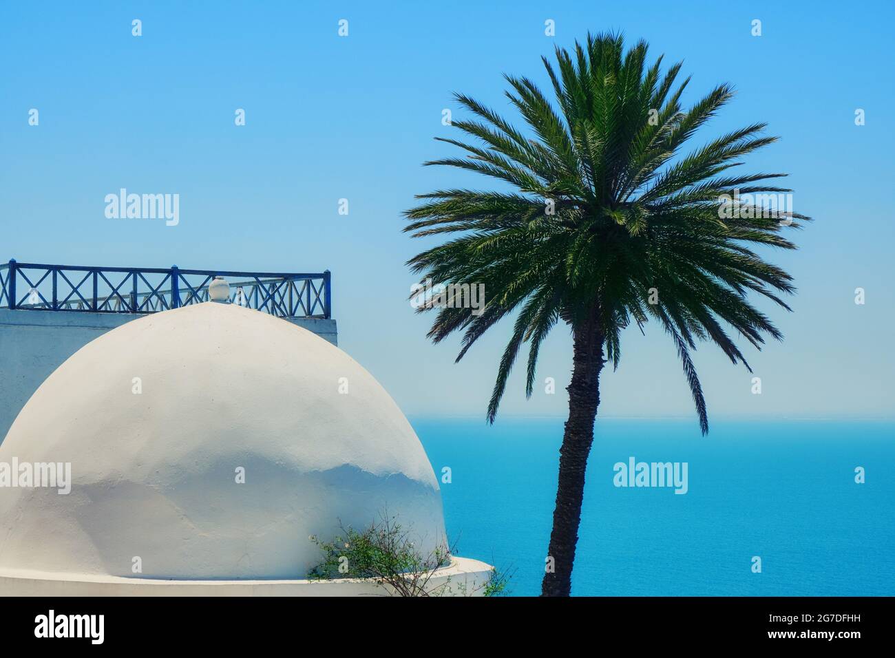 Round roof Arab house, sea and palm in Sidi Bou Said, Tunisia Stock ...