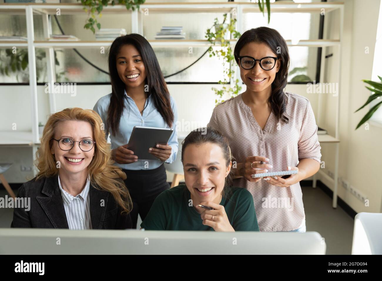 Diverse female business team at office workplace with computer Stock ...