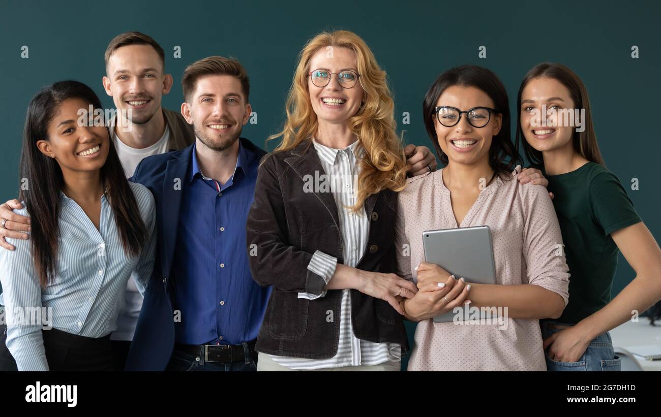 Happy corporate mature mentor and multiethnic group of interns Stock ...