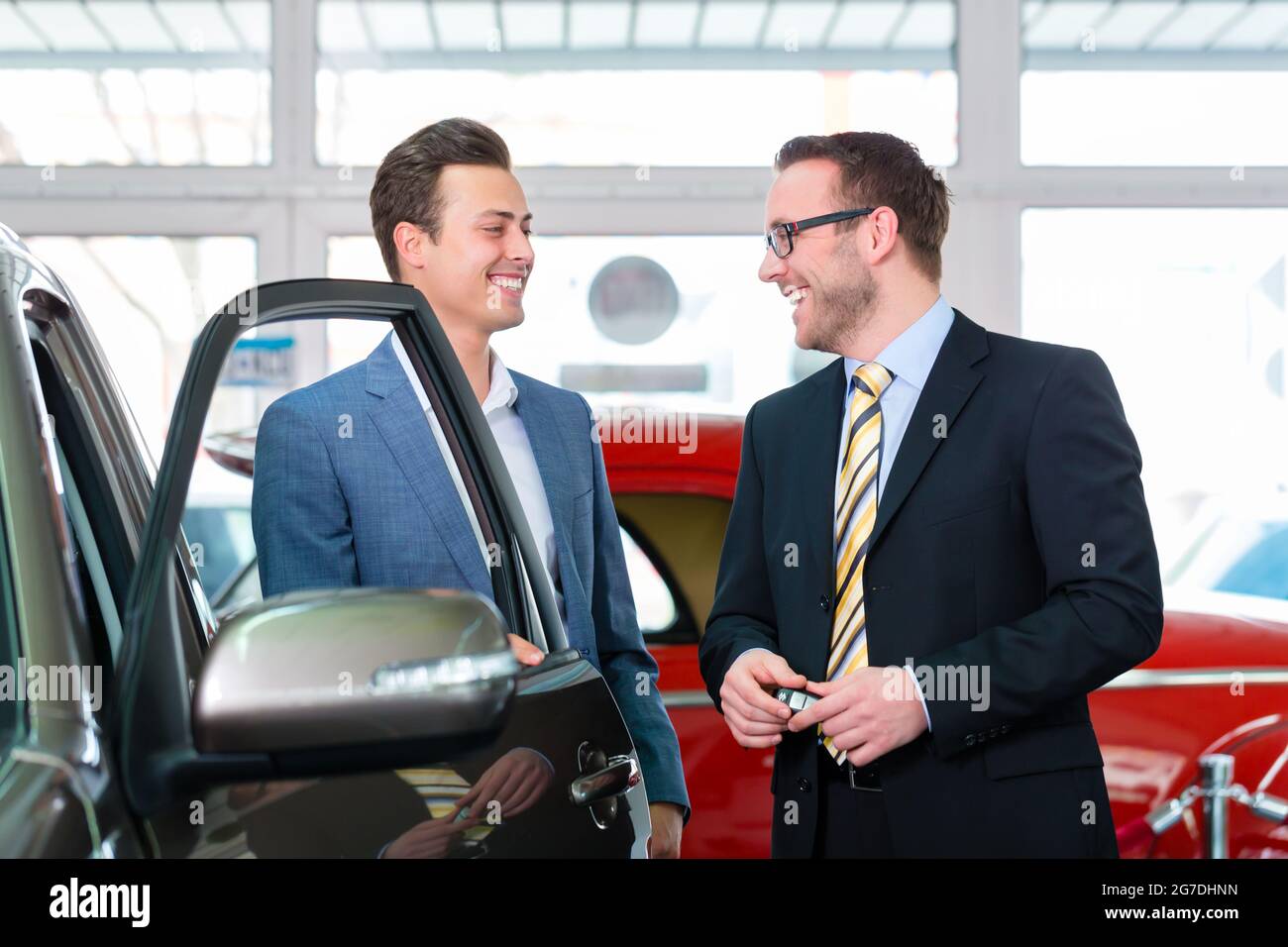 Test drive car salesman hi-res stock photography and images - Alamy