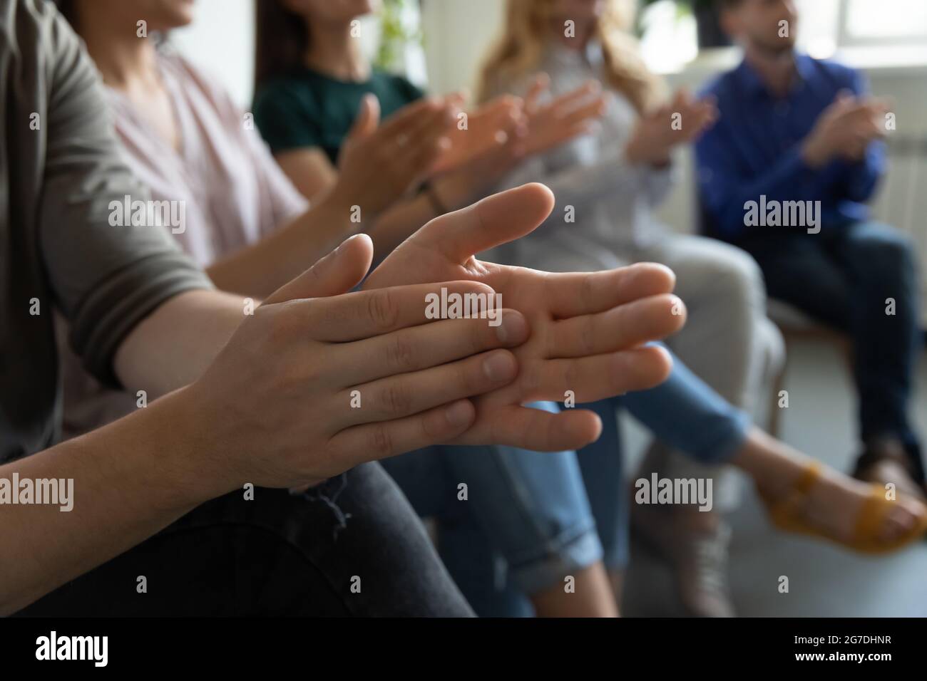 Hands of audience applauding speaker, presenter for speech ...