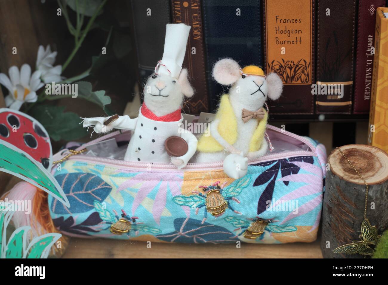 Colourful Little Felt Mice inside a stylish bee purse in the window of ...