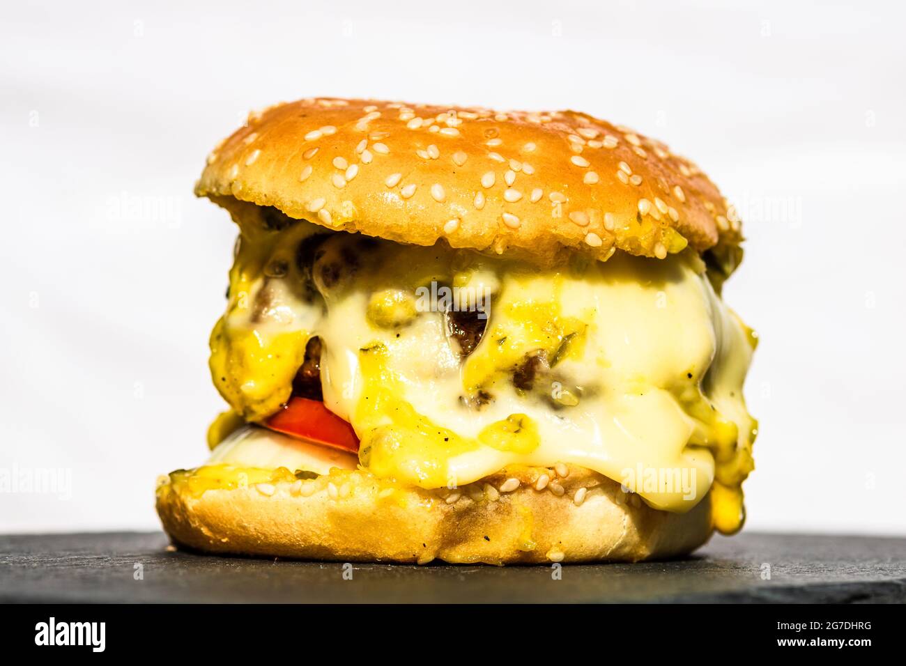 Fresh tasty beef cheeseburger with melted cheese isolated on white ...