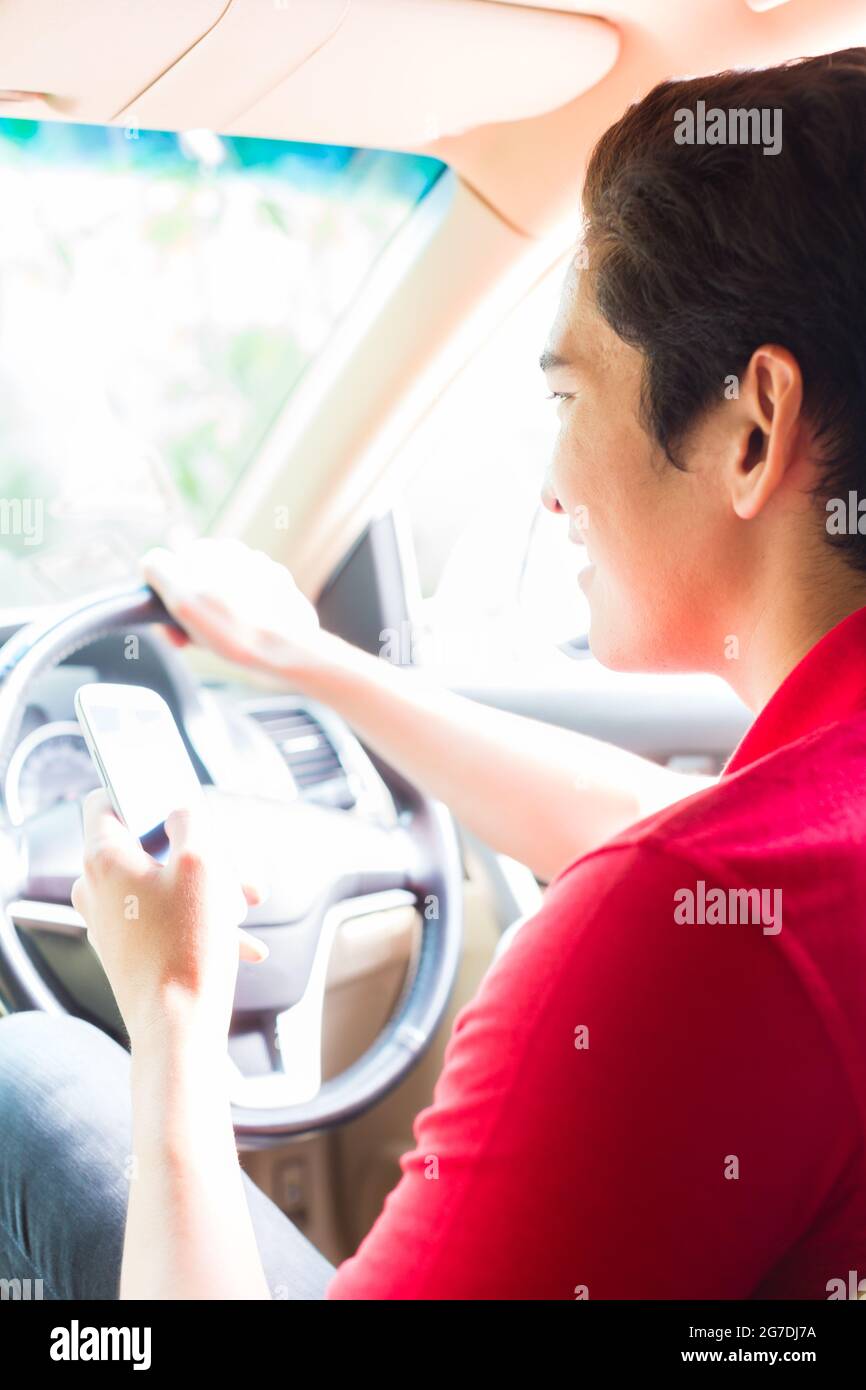 Young man texting message hi-res stock photography and images - Alamy