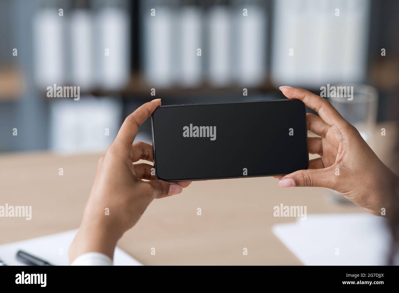 Close up of woman hands hold phone, using smartphone to checking email ...