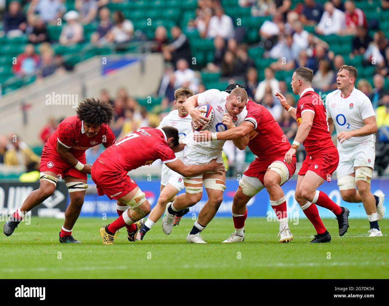England flanker Sam Underhill held by Rugby Canada flanker Lucas ...