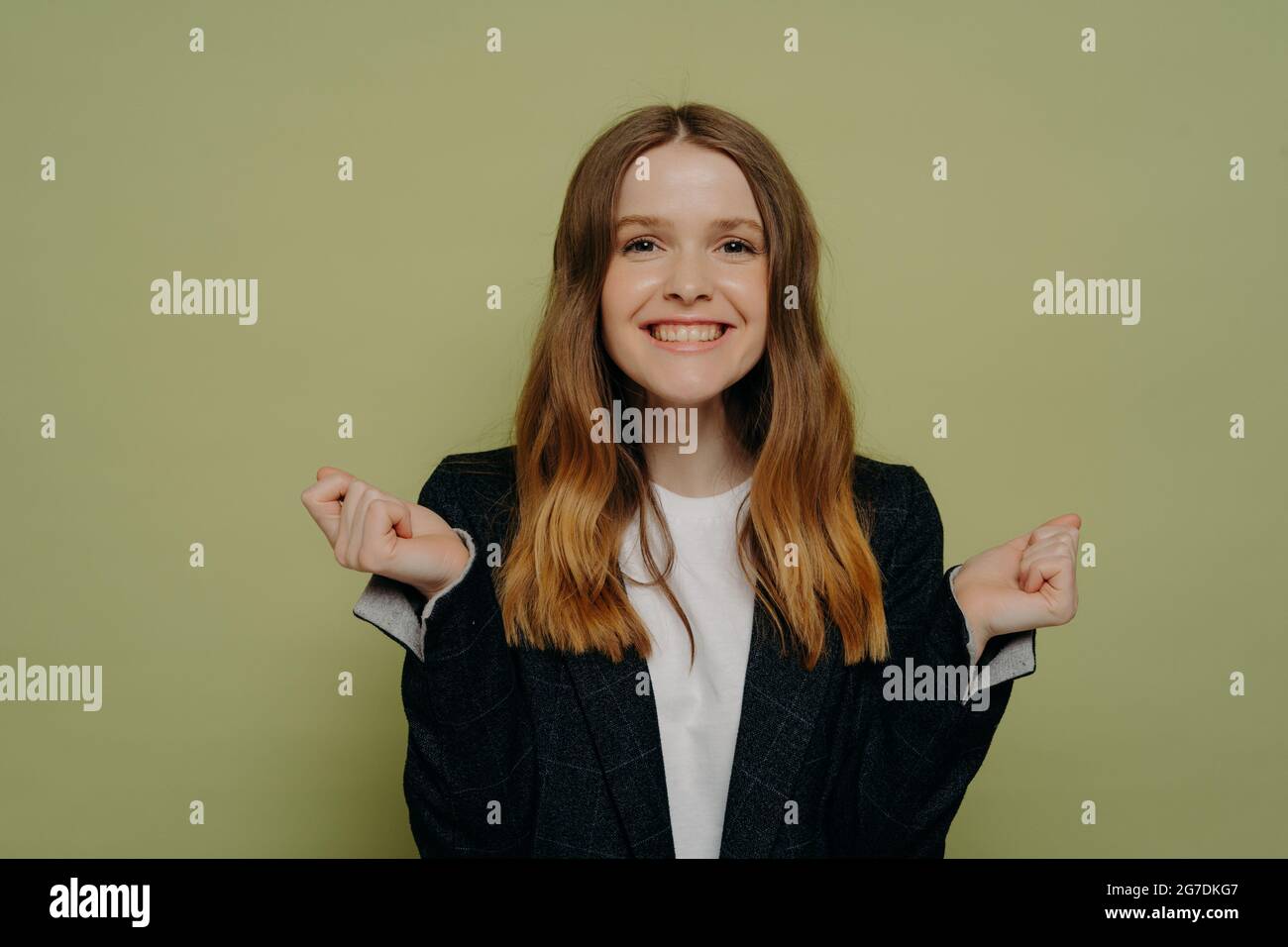 Happy excited teenage girl celebrating victory Stock Photo - Alamy
