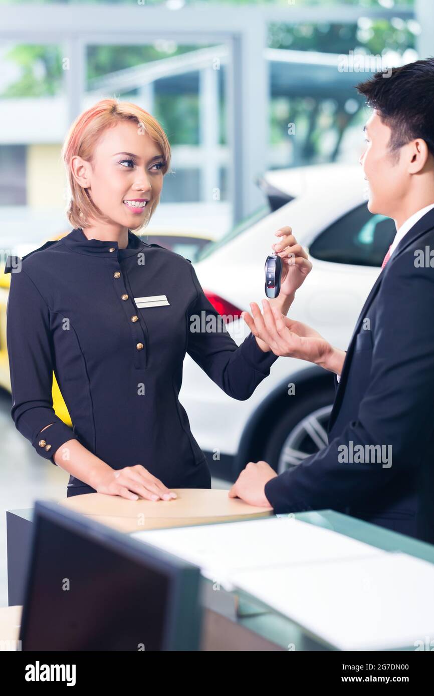 Asian man car rental hi-res stock photography and images - Alamy