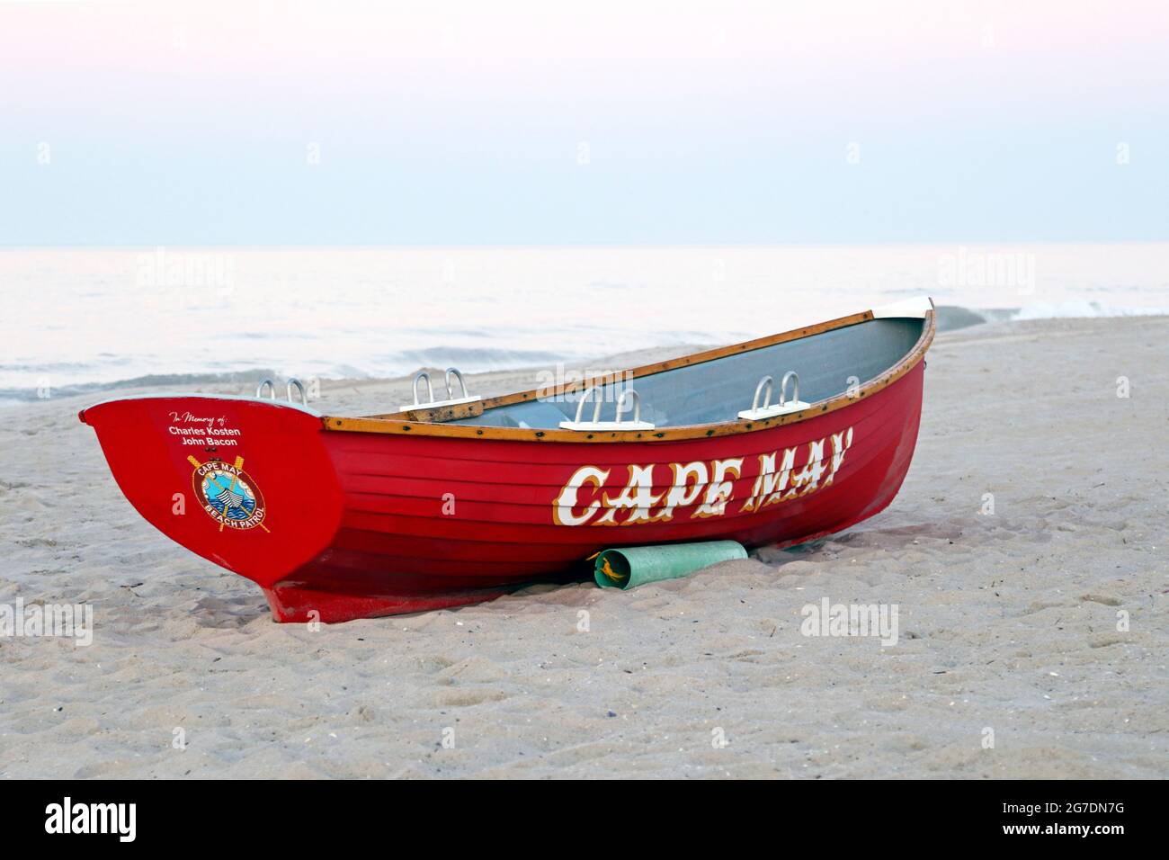 Red dinghy on beach hi-res stock photography and images - Alamy