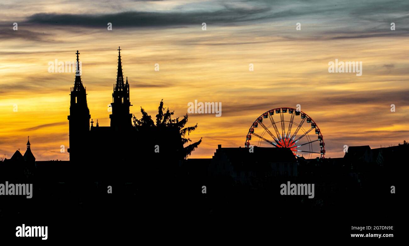 Basel skyline with Ferris wheel and Munster Stock Photo - Alamy