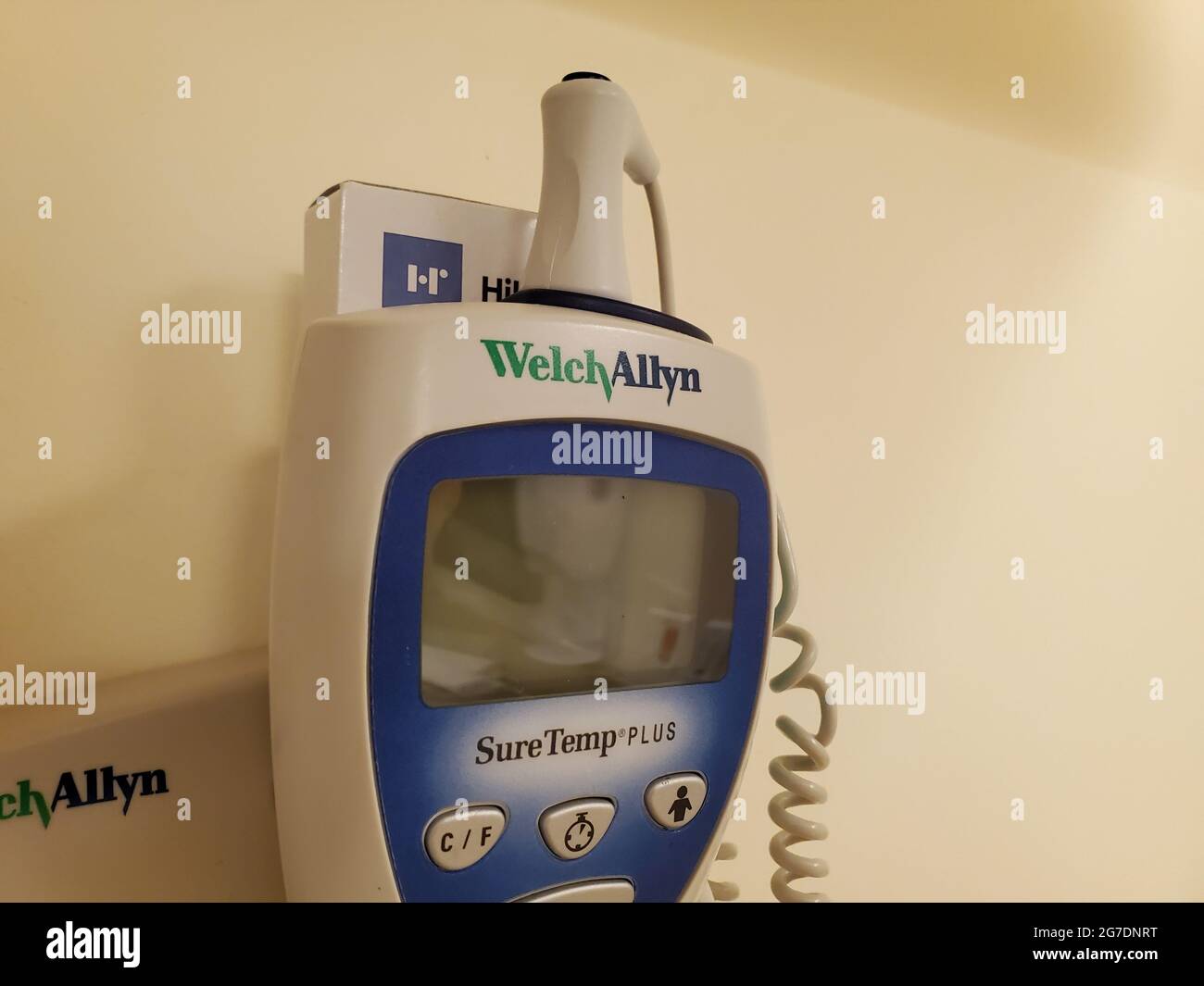 Side shot of the Welch Allyn Sure Temp Plus thermometer in a medical ...