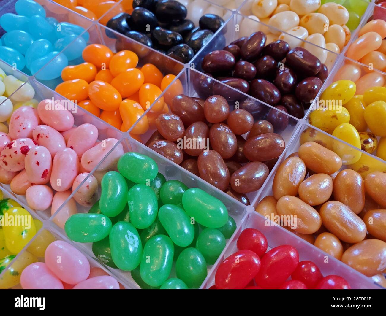 Close-up shot of an assortment of multi-colored Jelly Belly jelly beans ...