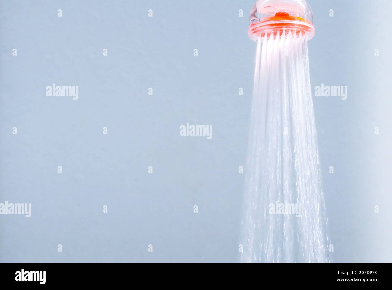 Transparent shower looks like made of glass or clear plastic, and water ...