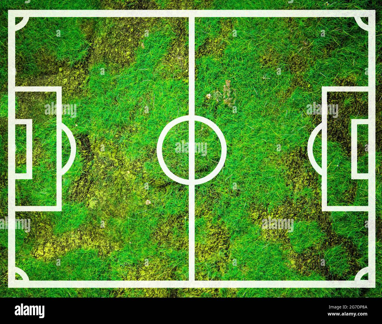 small toy football field made of artificial grass with markings applied ...