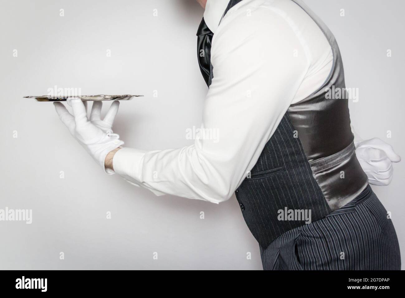 White Gloves Butler High Resolution Stock Photography and Images - Alamy