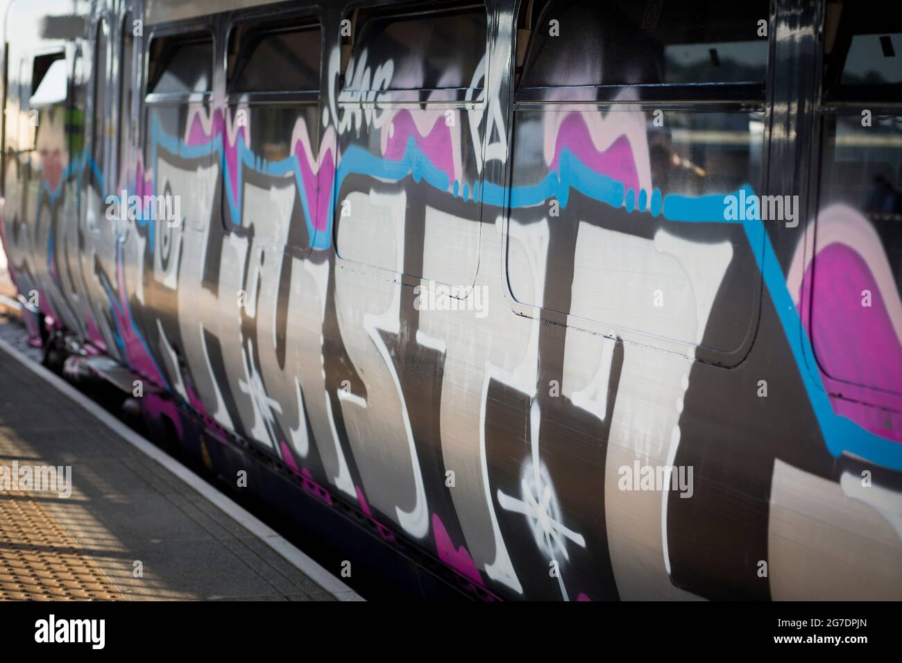 Train carriages damaged by graffiti in a station in Kent, England, UK ...
