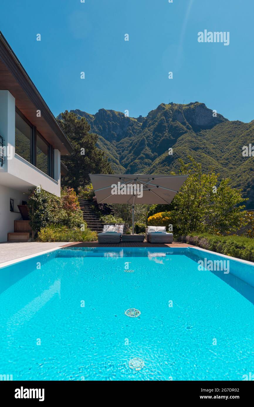 Modern two-story house with large pool overlooking the mountains. Two ...