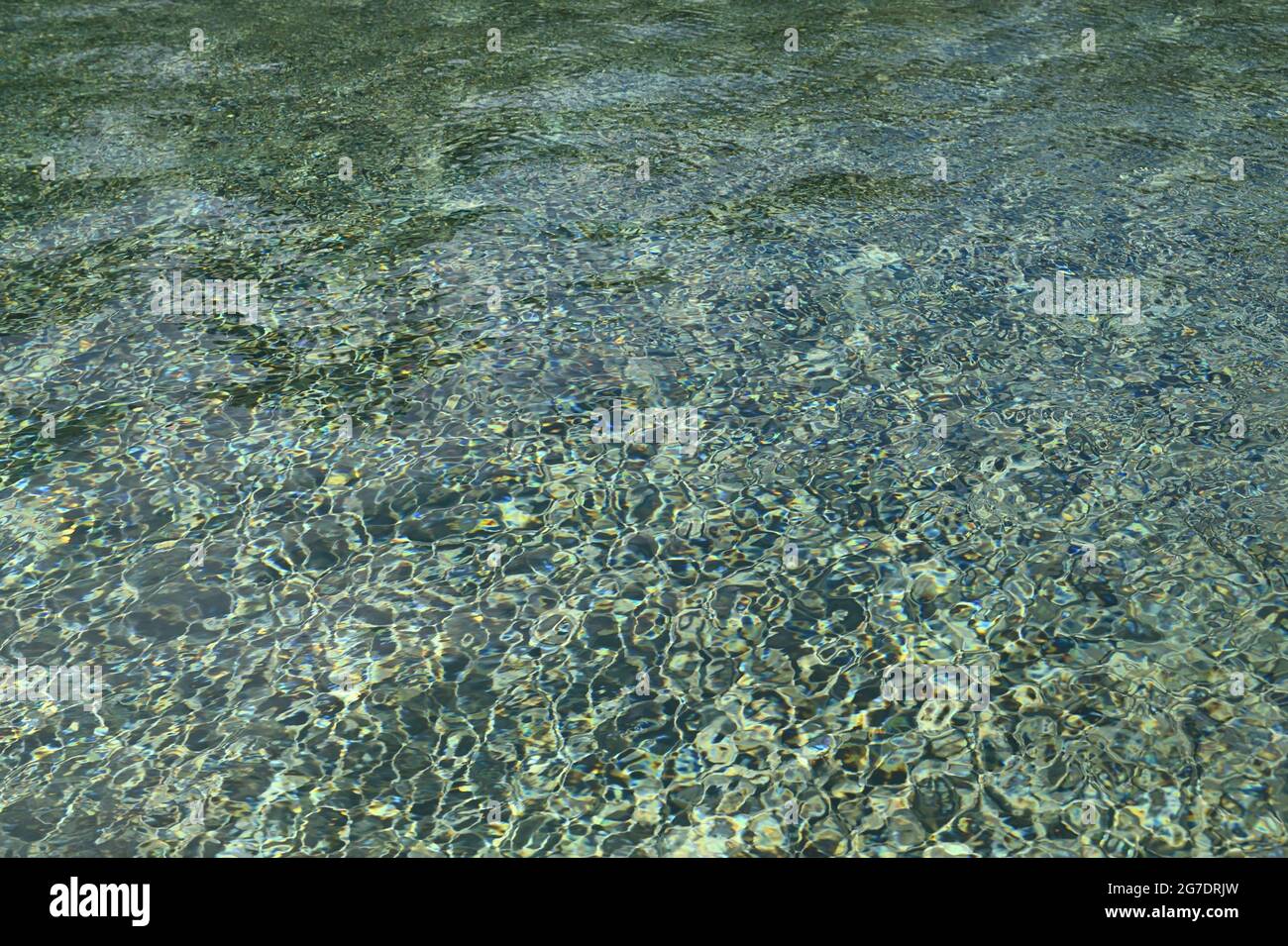 Swimming pool water sun reflection background Stock Photo - Alamy