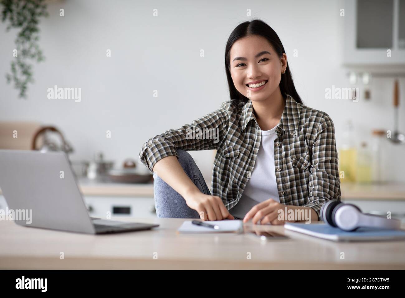 Asian woman working home typing hi-res stock photography and images - Alamy