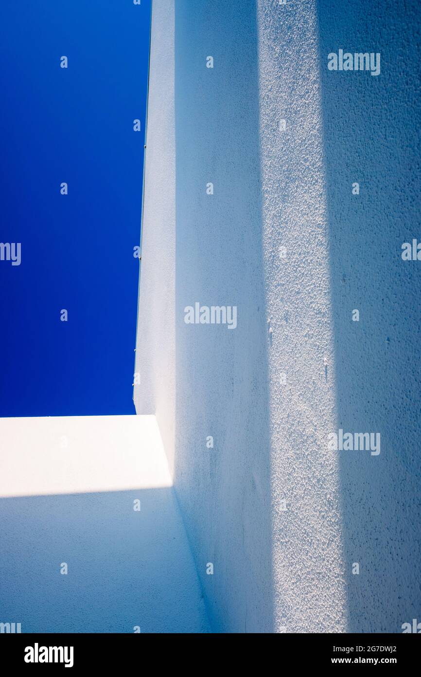 White walls geometric angled shapes of simple and clean design in sunny ...