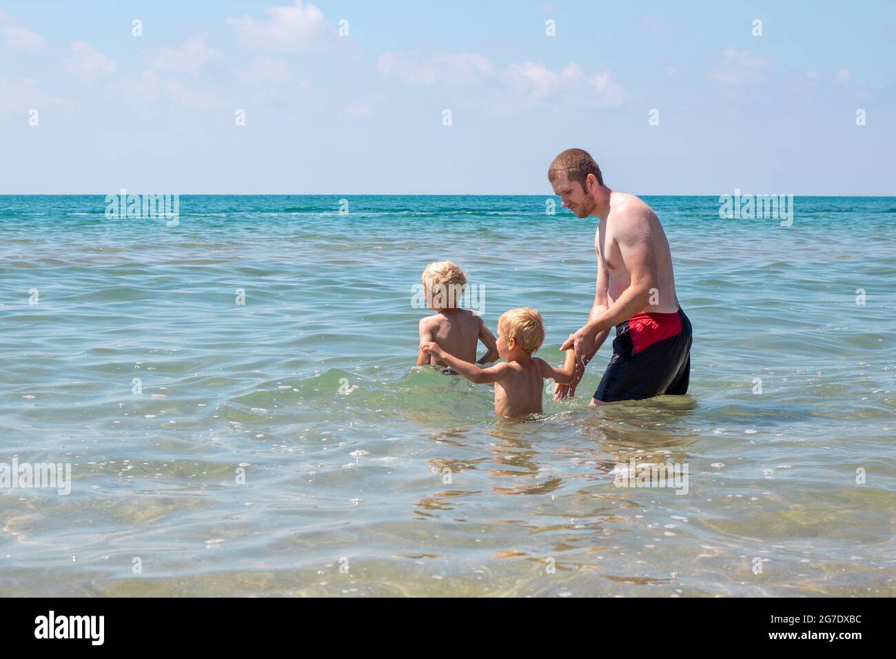 Blond children playing dad father hi-res stock photography and images ...