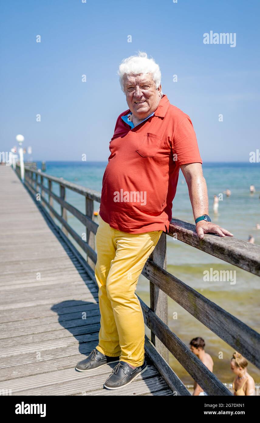 Scharbeutz, Germany. 18th June, 2021. Hans Meiser stands on the ...