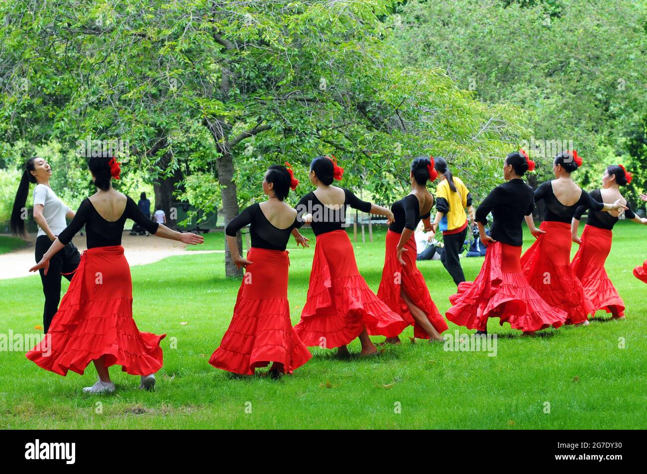 London, UK. 13th July, 2021. Spanish dancing in St James Park. Sunny ...
