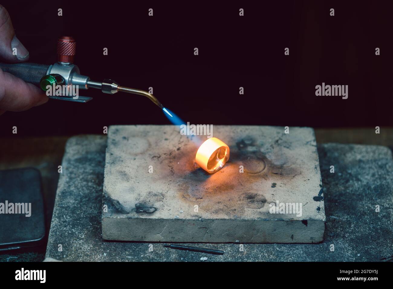 Goldsmith heating up a ring hi-res stock photography and images - Alamy