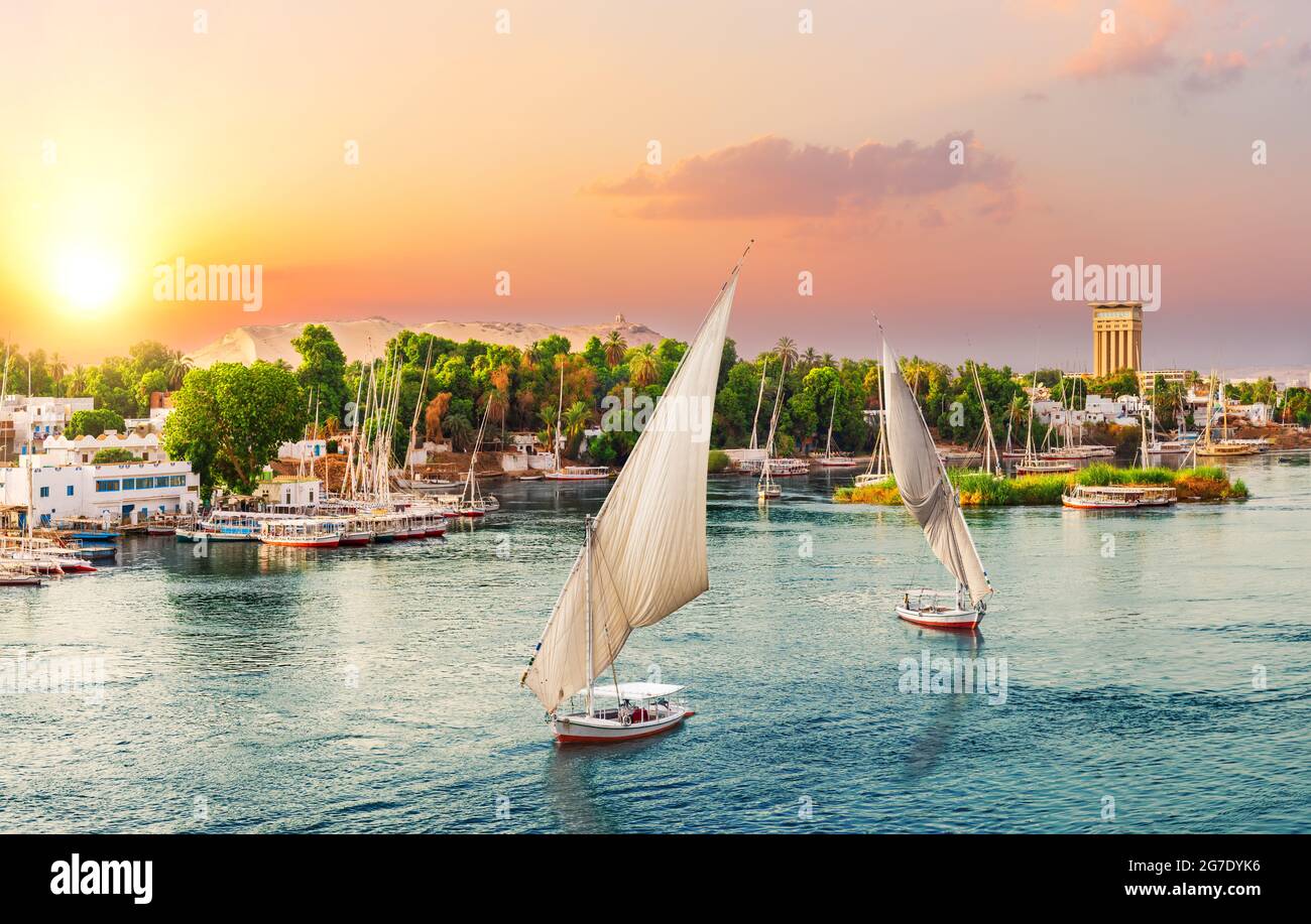 Sunset in Aswan, scenery of the Nile and boats, Egypt Stock Photo - Alamy