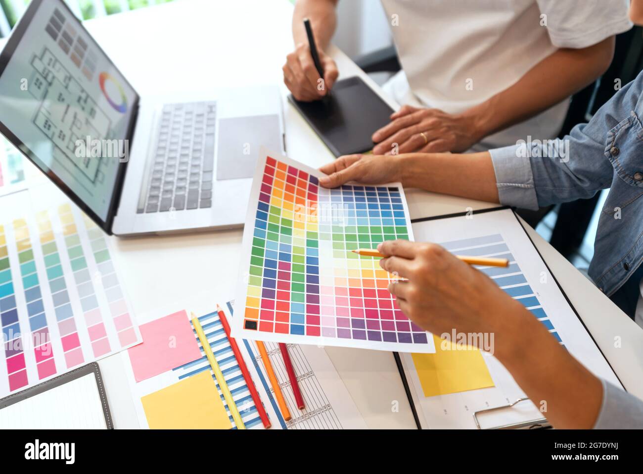 both coworkers designing some products choosing the appropriate shade ...
