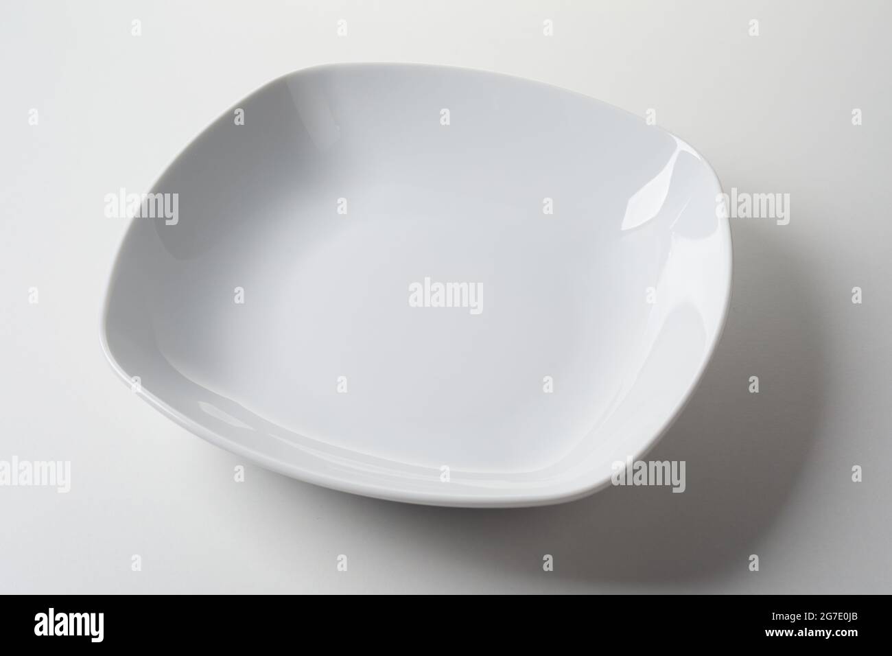 Simple generic clean empty white rectangular bowl for serving side ...