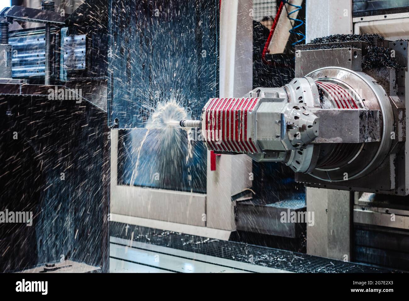 Industrial milling machine robot working on workpiece Stock Photo - Alamy