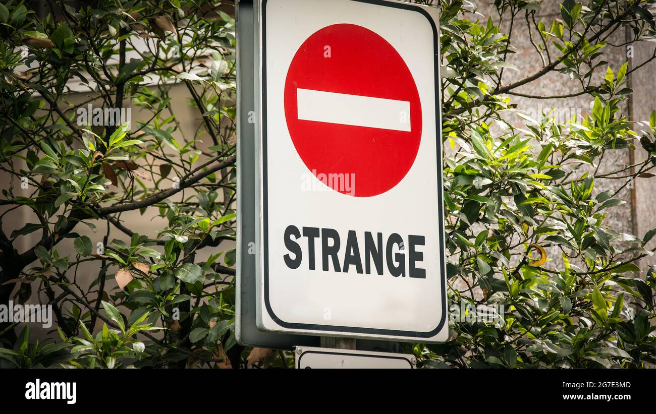 Street Sign the Direction Way to Normal versus Strange Stock Photo - Alamy