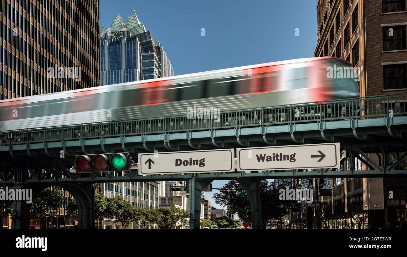 Street Sign the Direction Way to Doing versus Waiting Stock Photo - Alamy
