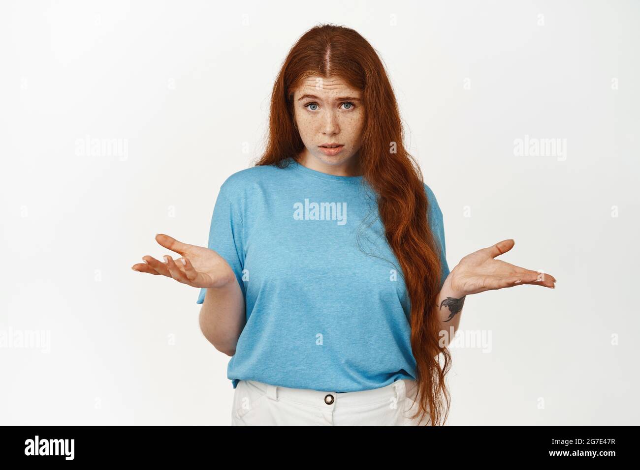 Teen girl shrugging High Resolution Stock Photography and Images - Alamy