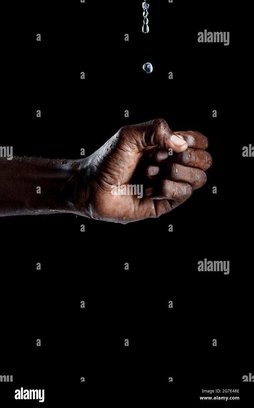 Hand punch through water hi-res stock photography and images - Alamy