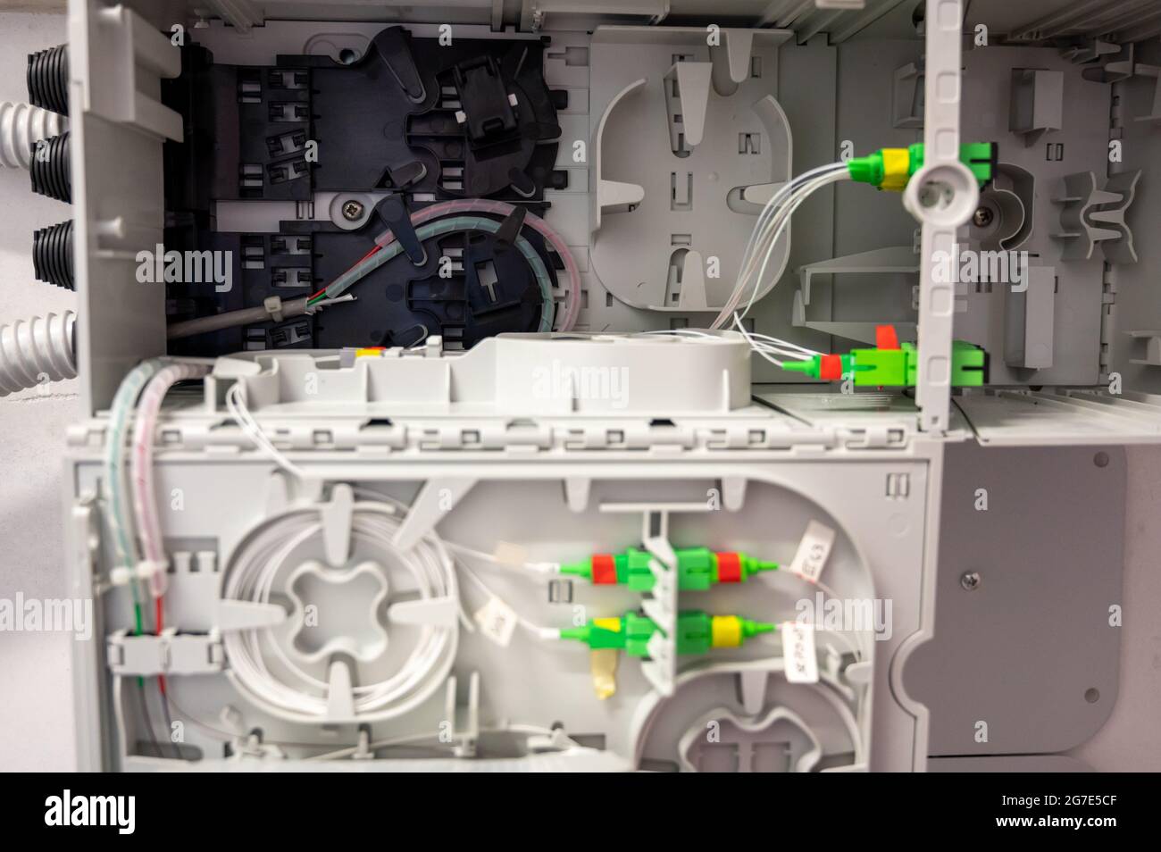 Close up shot of cabling of the optical fibers inside the distribution ...
